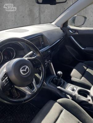 Black Mazda CX-3 2014 in Vilnius, with an engine capacity of 2.20 L and mileage of 178 thousand km for 3950 €, photo 12 on AUTOMOTO.COM.LV