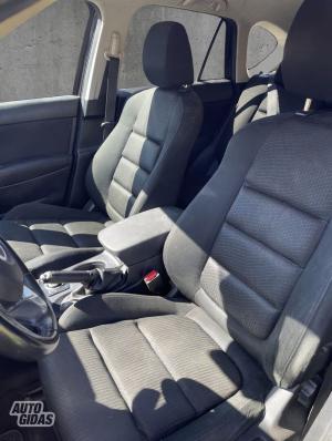 Black Mazda CX-3 2014 in Vilnius, with an engine capacity of 2.20 L and mileage of 178 thousand km for 3950 €, photo 13 on AUTOMOTO.COM.LV