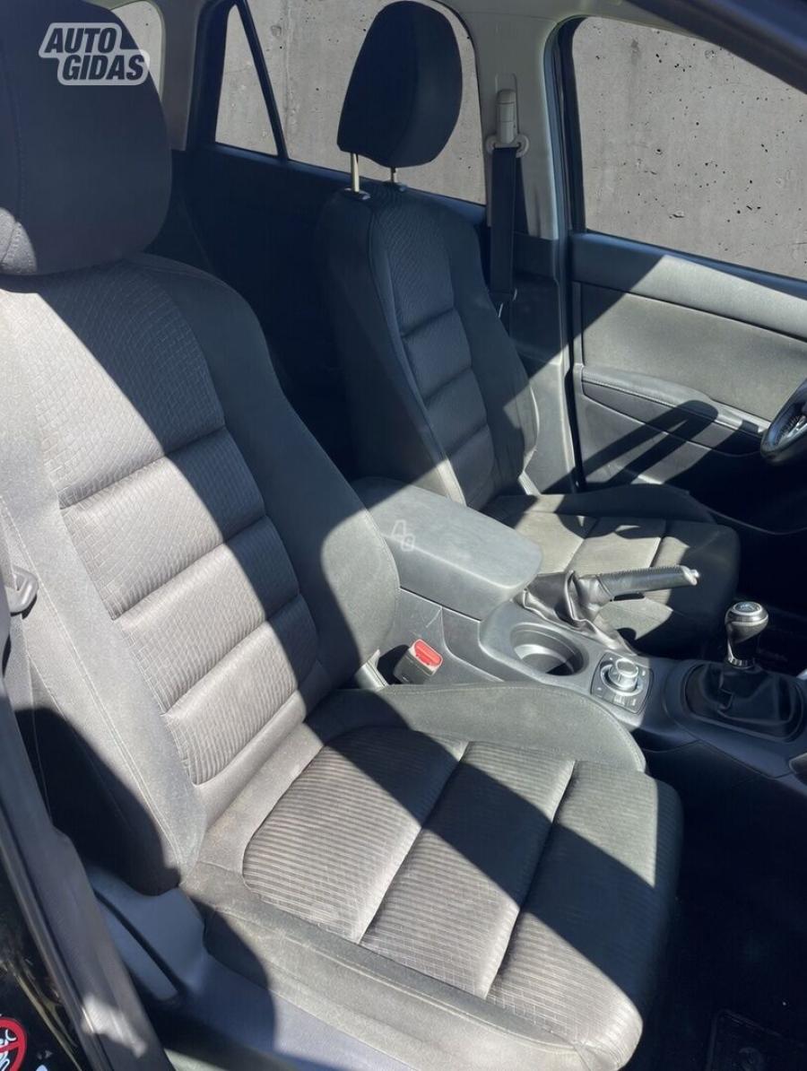 Black Mazda CX-3 2014 in Vilnius, with an engine capacity of 2.20 L and mileage of 178 thousand km for 3950 €, photo 14 on AUTOMOTO.COM.LV