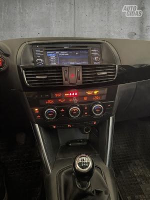 Black Mazda CX-3 2014 in Vilnius, with an engine capacity of 2.20 L and mileage of 178 thousand km for 3950 €, photo 17 on AUTOMOTO.COM.LV