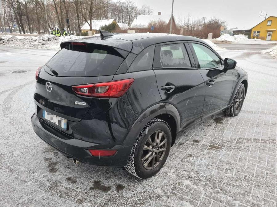 Black Mazda CX-3 2015 in Taurage, with an engine capacity of 1.50 L and mileage of 250 thousand km for 6900 €, photo 3 on AUTOMOTO.COM.LV