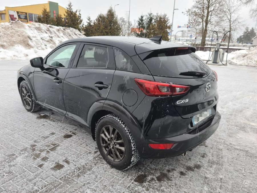 Black Mazda CX-3 2015 in Taurage, with an engine capacity of 1.50 L and mileage of 250 thousand km for 6900 €, photo 4 on AUTOMOTO.COM.LV