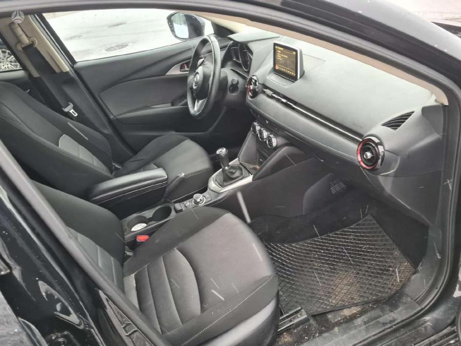 Black Mazda CX-3 2015 in Taurage, with an engine capacity of 1.50 L and mileage of 250 thousand km for 6900 €, photo 5 on AUTOMOTO.COM.LV