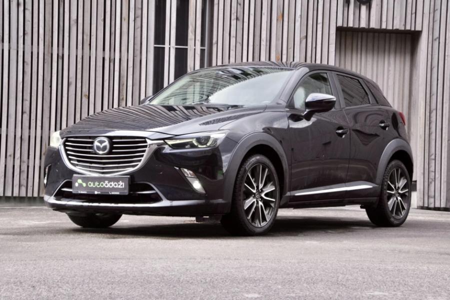 Black Mazda CX-3 2015 in Riga, with an engine capacity of 1.50 L and mileage of 158 thousand km for 10900 €, photo 1 on AUTOMOTO.COM.LV
