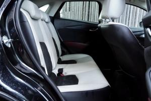 Black Mazda CX-3 2015 in Riga, with an engine capacity of 1.50 L and mileage of 158 thousand km for 10900 €, photo 4 on AUTOMOTO.COM.LV