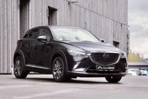 Black Mazda CX-3 2015 in Riga, with an engine capacity of 1.50 L and mileage of 158 thousand km for 10900 €, photo 7 on AUTOMOTO.COM.LV