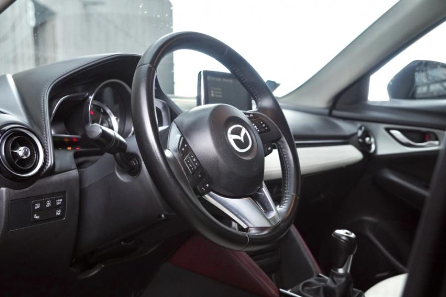 Black Mazda CX-3 2015 in Riga, with an engine capacity of 1.50 L and mileage of 158 thousand km for 10900 €, photo 19 on AUTOMOTO.COM.LV