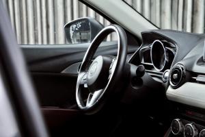 Black Mazda CX-3 2015 in Riga, with an engine capacity of 1.50 L and mileage of 158 thousand km for 10900 €, photo 21 on AUTOMOTO.COM.LV