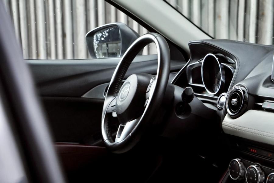 Black Mazda CX-3 2015 in Riga, with an engine capacity of 1.50 L and mileage of 158 thousand km for 10900 €, photo 21 on AUTOMOTO.COM.LV