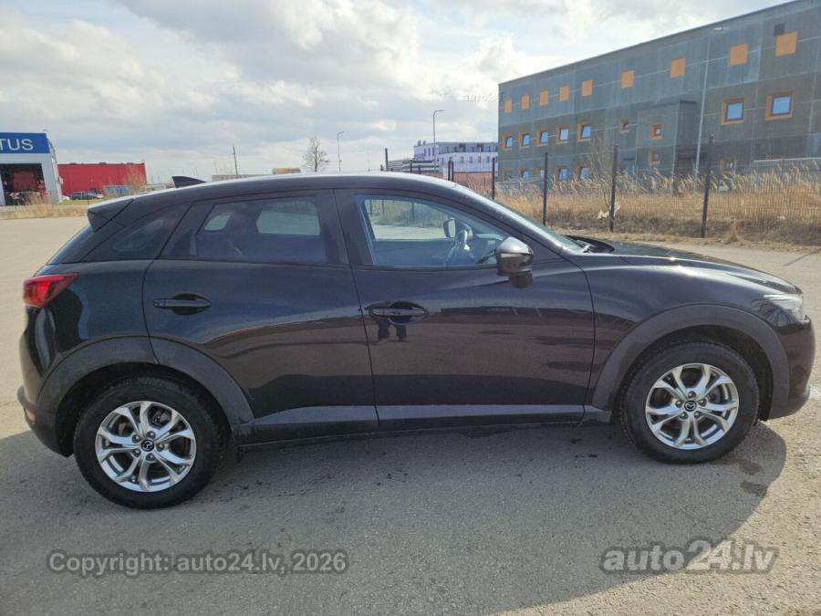 Black Mazda CX-3 2016 in Tartu, with an engine capacity of 1.50 L and mileage of 217 thousand km for 8888 €, photo 4 on AUTOMOTO.COM.LV