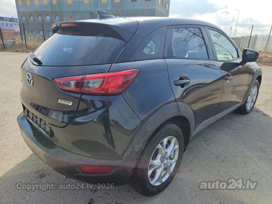 Black Mazda CX-3 2016 in Tartu, with an engine capacity of 1.50 L and mileage of 217 thousand km for 8888 €, photo 5 on AUTOMOTO.COM.LV