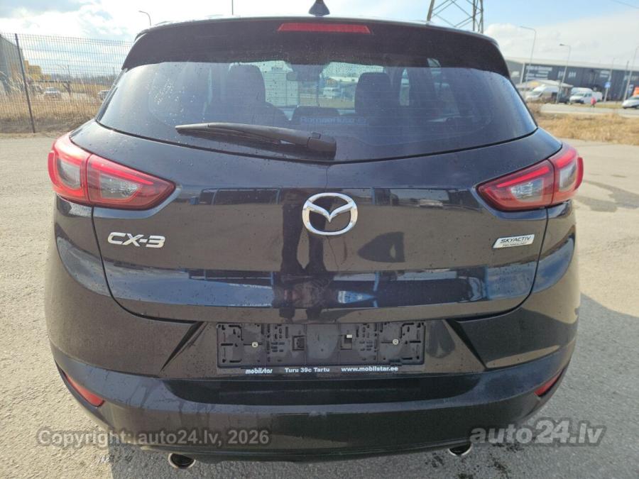 Black Mazda CX-3 2016 in Tartu, with an engine capacity of 1.50 L and mileage of 217 thousand km for 8888 €, photo 6 on AUTOMOTO.COM.LV