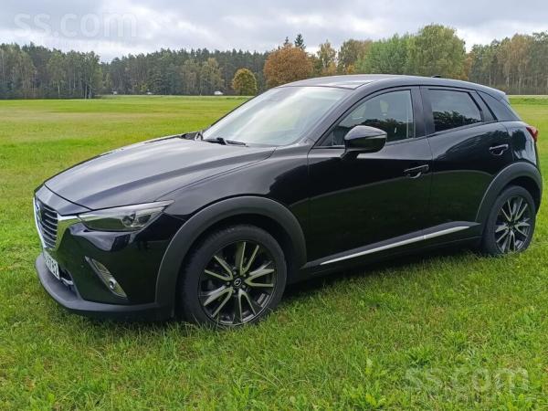 Black Mazda CX-3 2016 in Riga, with an engine capacity of 1.50 L and mileage of 166 thousand km for 8500 €, photo 1 on AUTOMOTO.COM.LV