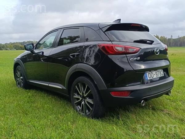 Black Mazda CX-3 2016 in Riga, with an engine capacity of 1.50 L and mileage of 166 thousand km for 8500 €, photo 5 on AUTOMOTO.COM.LV
