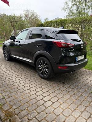 Black Mazda CX-3 2017 in Riga, with an engine capacity of 2.00 L and mileage of 100 thousand km for 14500 €, photo 5 on AUTOMOTO.COM.LV