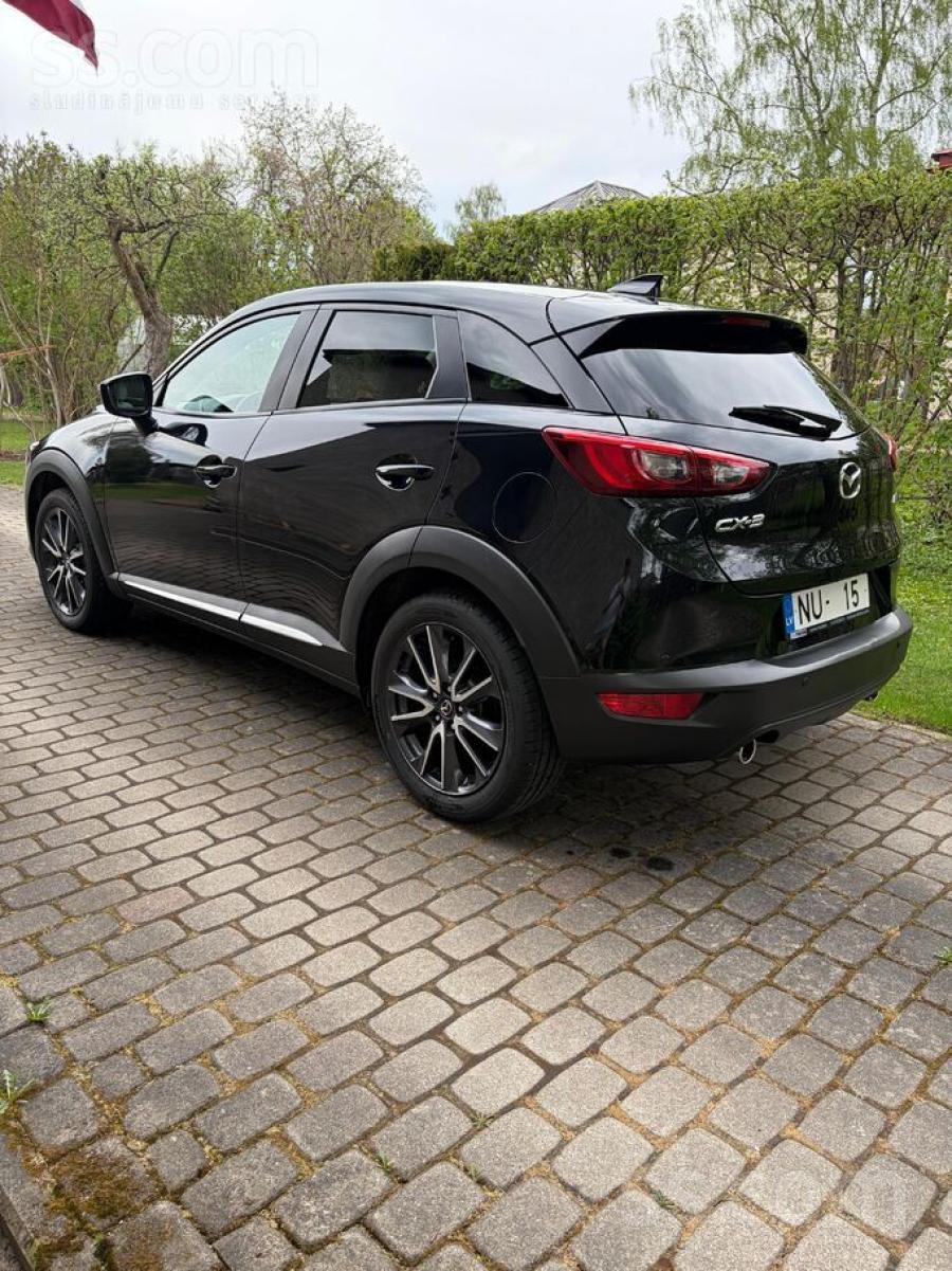 Black Mazda CX-3 2017 in Riga, with an engine capacity of 2.00 L and mileage of 100 thousand km for 14500 €, photo 5 on AUTOMOTO.COM.LV
