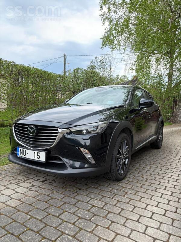 Black Mazda CX-3 2017 in Riga, with an engine capacity of 2.00 L and mileage of 100 thousand km for 14500 €, photo 5 on AUTOMOTO.COM.LV