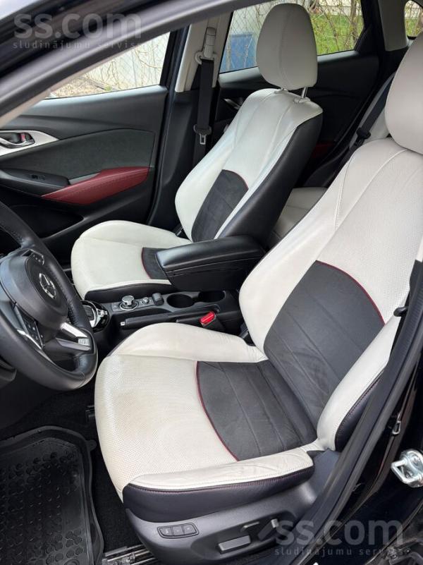 Black Mazda CX-3 2017 in Riga, with an engine capacity of 2.00 L and mileage of 100 thousand km for 14500 €, photo 8 on AUTOMOTO.COM.LV