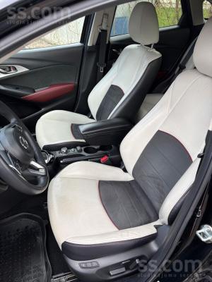 Black Mazda CX-3 2017 in Riga, with an engine capacity of 2.00 L and mileage of 100 thousand km for 14500 €, photo 9 on AUTOMOTO.COM.LV