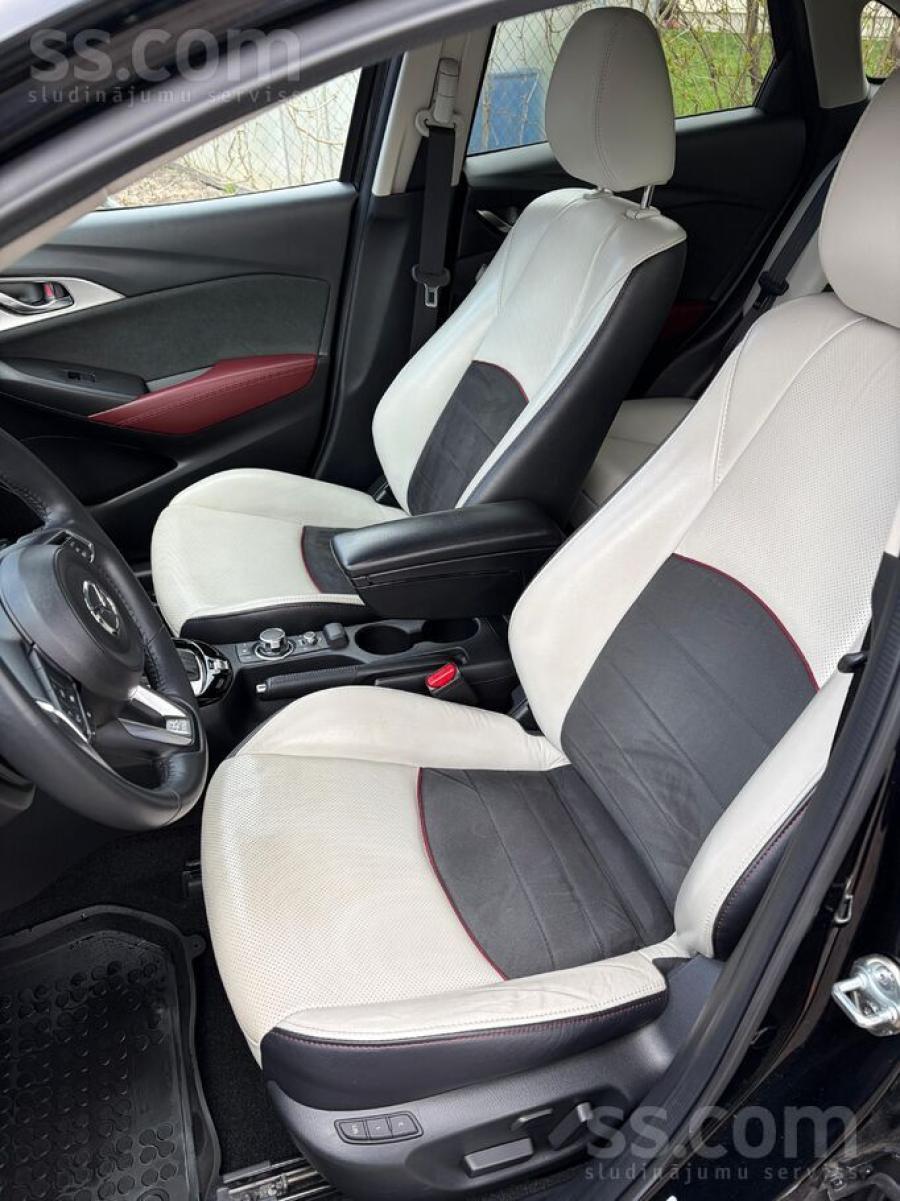 Black Mazda CX-3 2017 in Riga, with an engine capacity of 2.00 L and mileage of 100 thousand km for 14500 €, photo 9 on AUTOMOTO.COM.LV
