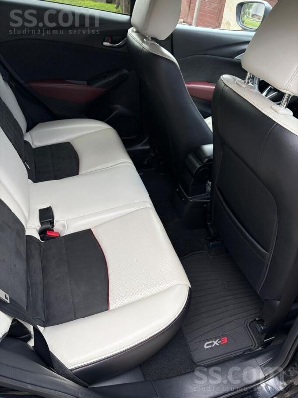 Black Mazda CX-3 2017 in Riga, with an engine capacity of 2.00 L and mileage of 100 thousand km for 14500 €, photo 10 on AUTOMOTO.COM.LV