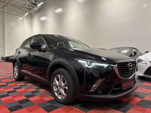 Black Mazda CX-3 2017 in Vilnius, with an engine capacity of 2.00 L and mileage of 100 thousand km for 12999 €, photo 4 on AUTOMOTO.COM.LV