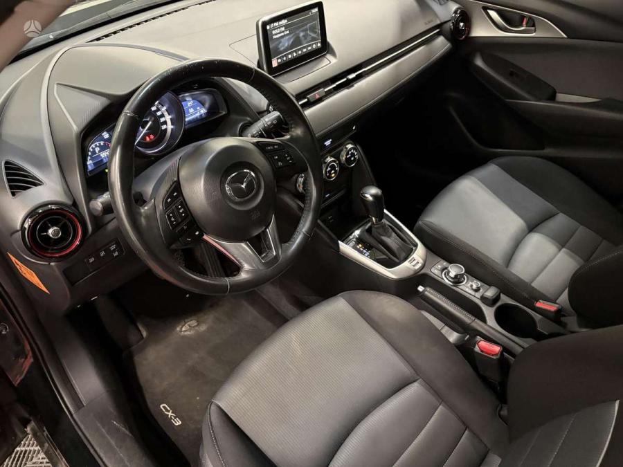Black Mazda CX-3 2017 in Vilnius, with an engine capacity of 2.00 L and mileage of 100 thousand km for 12999 €, photo 13 on AUTOMOTO.COM.LV