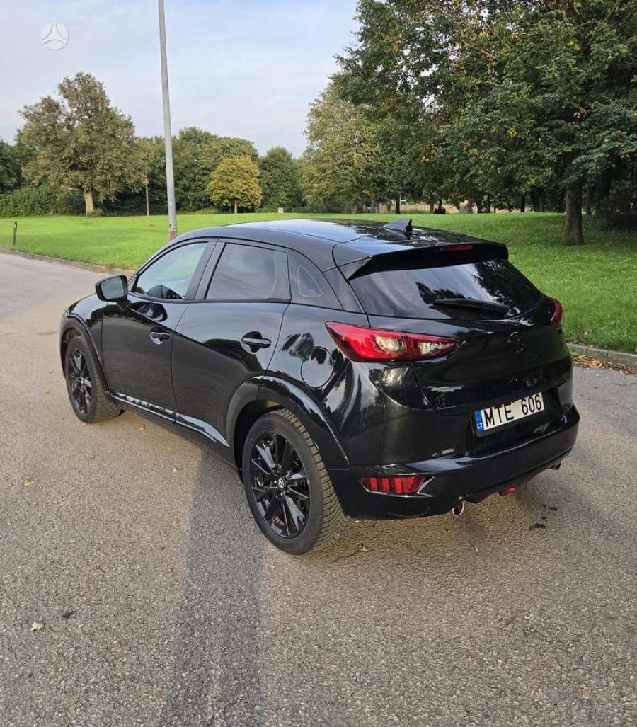 Black Mazda CX-3 2018 in Klaipeda, with an engine capacity of 2.00 L and mileage of 129 thousand km for 12500 €, photo 6 on AUTOMOTO.COM.LV