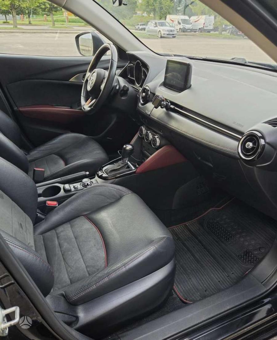 Black Mazda CX-3 2018 in Klaipeda, with an engine capacity of 2.00 L and mileage of 129 thousand km for 12500 €, photo 12 on AUTOMOTO.COM.LV
