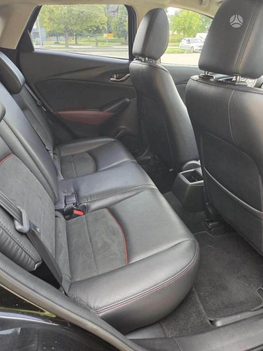 Black Mazda CX-3 2018 in Klaipeda, with an engine capacity of 2.00 L and mileage of 129 thousand km for 12500 €, photo 13 on AUTOMOTO.COM.LV