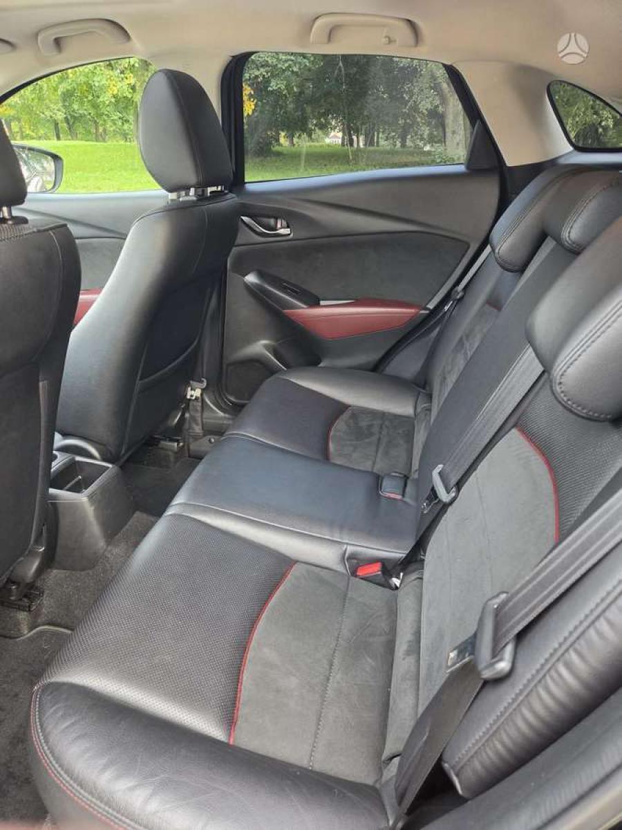 Black Mazda CX-3 2018 in Klaipeda, with an engine capacity of 2.00 L and mileage of 129 thousand km for 12500 €, photo 14 on AUTOMOTO.COM.LV