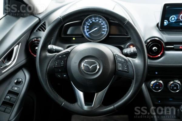 Blue Mazda CX-3 2016 in Riga, with an engine capacity of 2.00 L and mileage of 148 thousand km for 9900 €, photo 8 on AUTOMOTO.COM.LV
