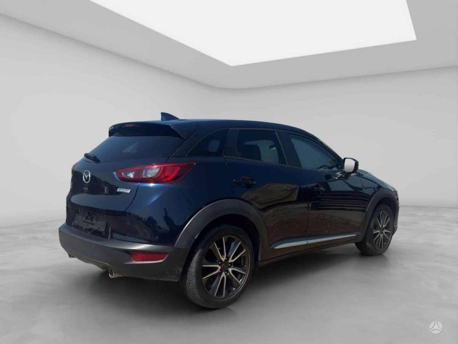 Blue Mazda CX-3 2016 in Kaunas, with an engine capacity of 1.50 L and mileage of 225 thousand km for 11390 €, photo 7 on AUTOMOTO.COM.LV