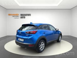 Blue Mazda CX-3 2017 in Riga, with an engine capacity of 2.00 L and mileage of 91 thousand km for 11290 €, photo 7 on AUTOMOTO.COM.LV