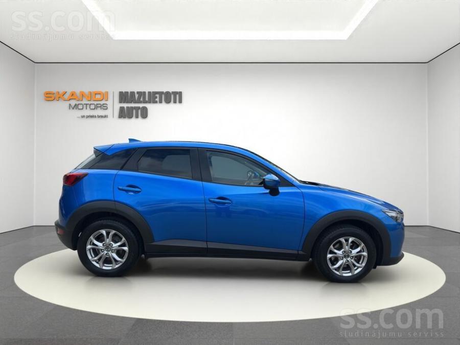 Blue Mazda CX-3 2017 in Riga, with an engine capacity of 2.00 L and mileage of 91 thousand km for 11290 €, photo 8 on AUTOMOTO.COM.LV