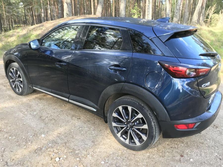 Blue Mazda CX-3 2019 in Riga, with an engine capacity of 2.00 L and mileage of 82 thousand km for 16490 €, photo 4 on AUTOMOTO.COM.LV