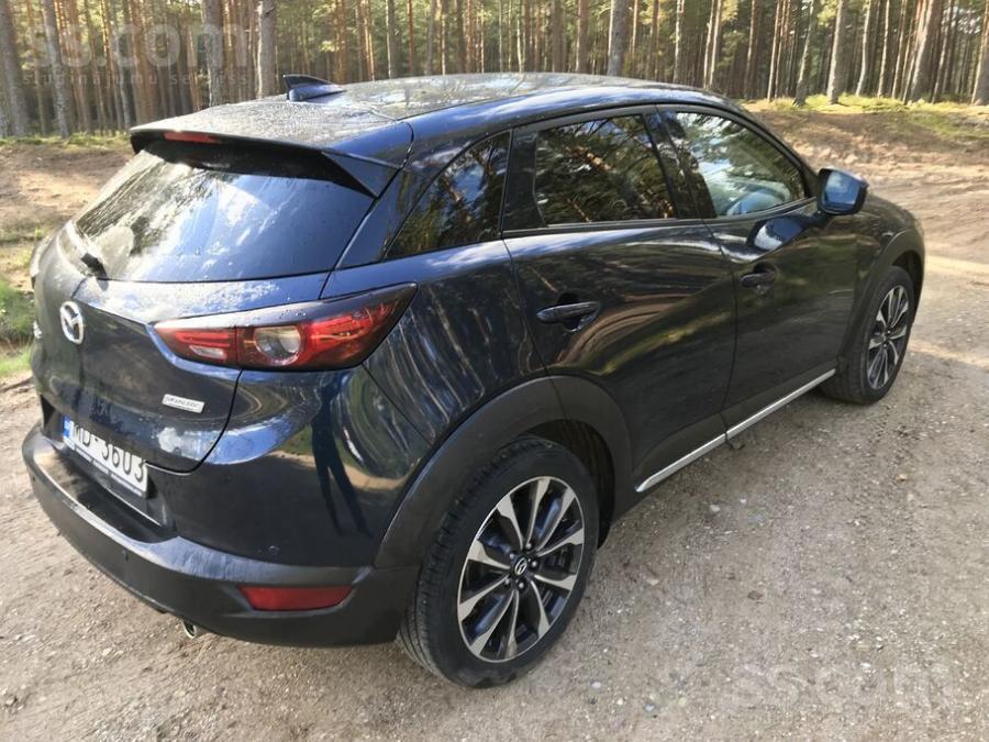 Blue Mazda CX-3 2019 in Riga, with an engine capacity of 2.00 L and mileage of 82 thousand km for 16490 €, photo 6 on AUTOMOTO.COM.LV