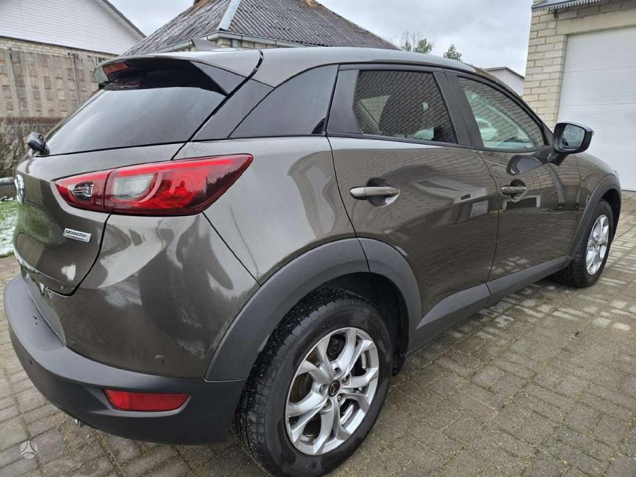 Brown Mazda CX-3 2016 in Ukmerge, with an engine capacity of 1.50 L and mileage of 126 thousand km for 8200 €, photo 5 on AUTOMOTO.COM.LV