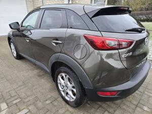 Brown Mazda CX-3 2016 in Ukmerge, with an engine capacity of 1.50 L and mileage of 126 thousand km for 8200 €, photo 7 on AUTOMOTO.COM.LV