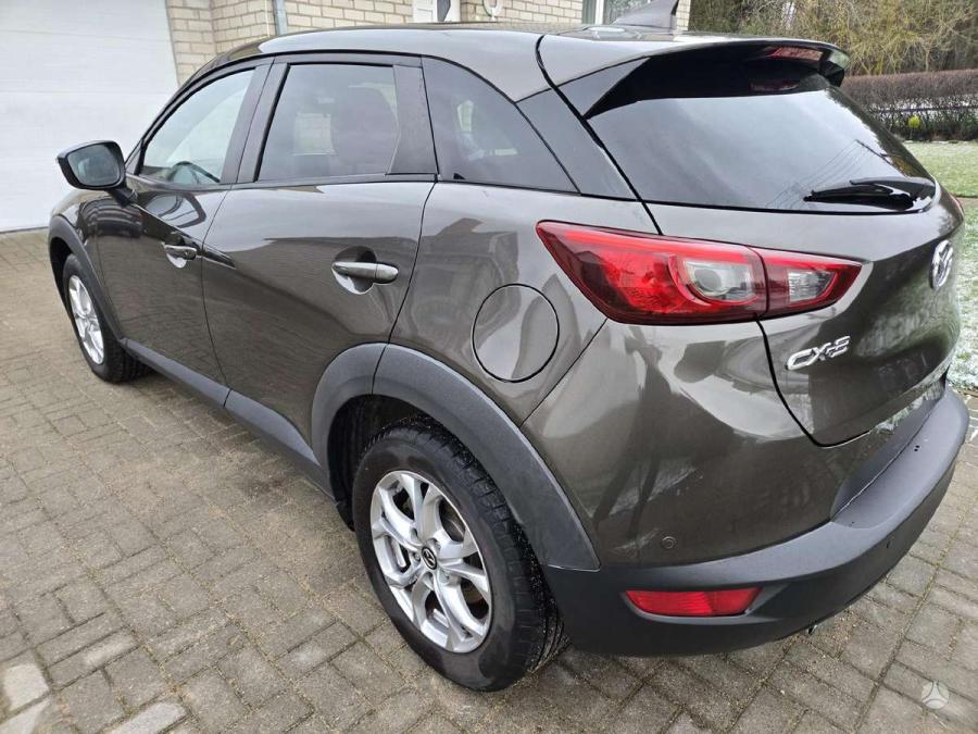 Brown Mazda CX-3 2016 in Ukmerge, with an engine capacity of 1.50 L and mileage of 126 thousand km for 8200 €, photo 7 on AUTOMOTO.COM.LV