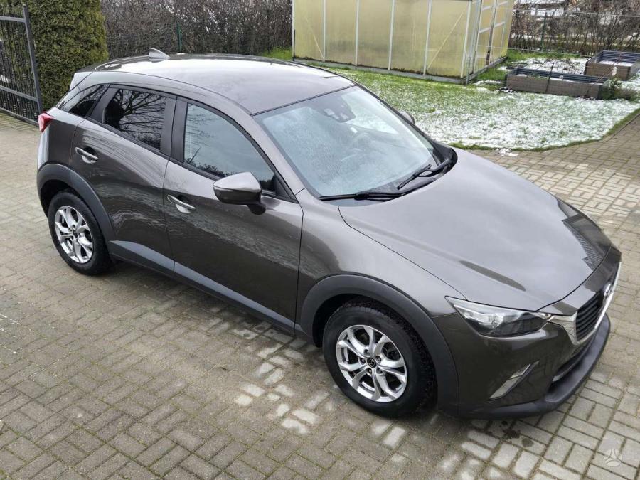 Brown Mazda CX-3 2016 in Ukmerge, with an engine capacity of 1.50 L and mileage of 126 thousand km for 8200 €, photo 8 on AUTOMOTO.COM.LV