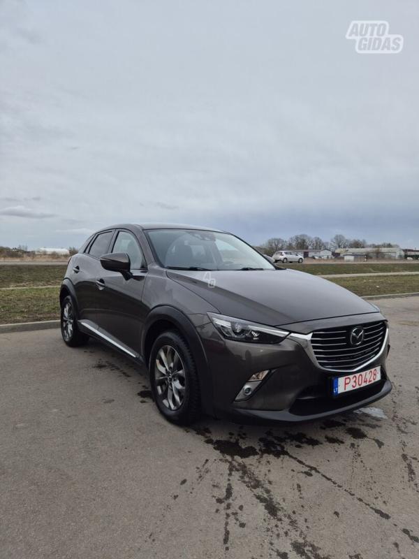 Brown Mazda CX-3 2016 in Kaunas, with an engine capacity of 1.50 L and mileage of 246 thousand km for 9000 €, photo 2 on AUTOMOTO.COM.LV