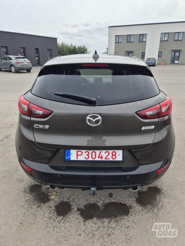 Brown Mazda CX-3 2016 in Kaunas, with an engine capacity of 1.50 L and mileage of 246 thousand km for 9000 €, photo 6 on AUTOMOTO.COM.LV