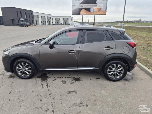 Brown Mazda CX-3 2016 in Kaunas, with an engine capacity of 1.50 L and mileage of 246 thousand km for 9000 €, photo 7 on AUTOMOTO.COM.LV