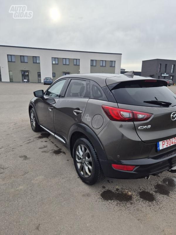 Brown Mazda CX-3 2016 in Kaunas, with an engine capacity of 1.50 L and mileage of 246 thousand km for 9000 €, photo 8 on AUTOMOTO.COM.LV