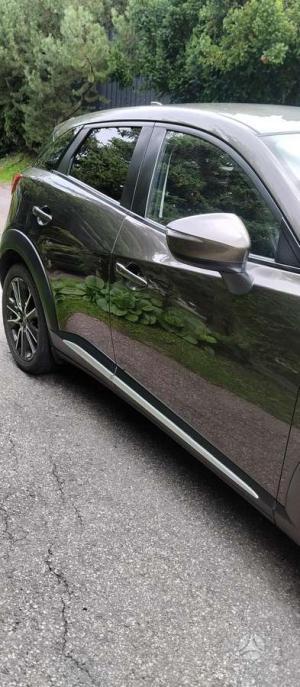 Brown Mazda CX-3 2016 in Kaunas, with an engine capacity of 1.50 L and mileage of 235 thousand km for 7400 €, photo 5 on AUTOMOTO.COM.LV