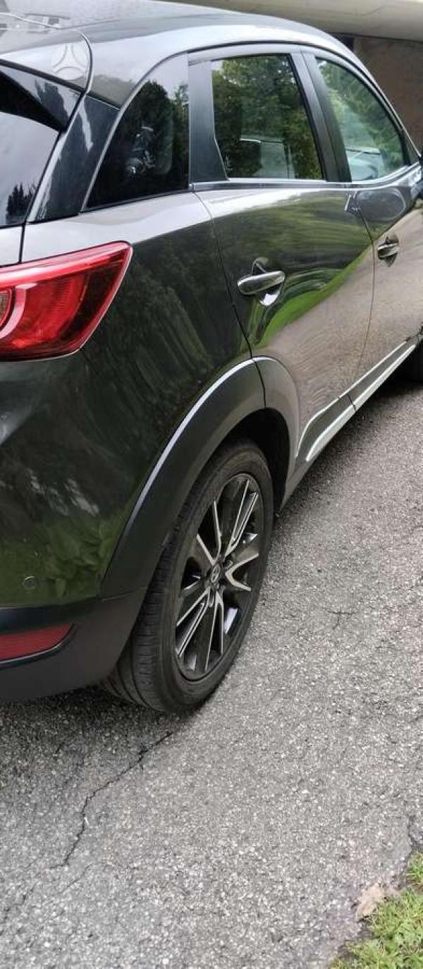 Brown Mazda CX-3 2016 in Kaunas, with an engine capacity of 1.50 L and mileage of 235 thousand km for 7400 €, photo 5 on AUTOMOTO.COM.LV