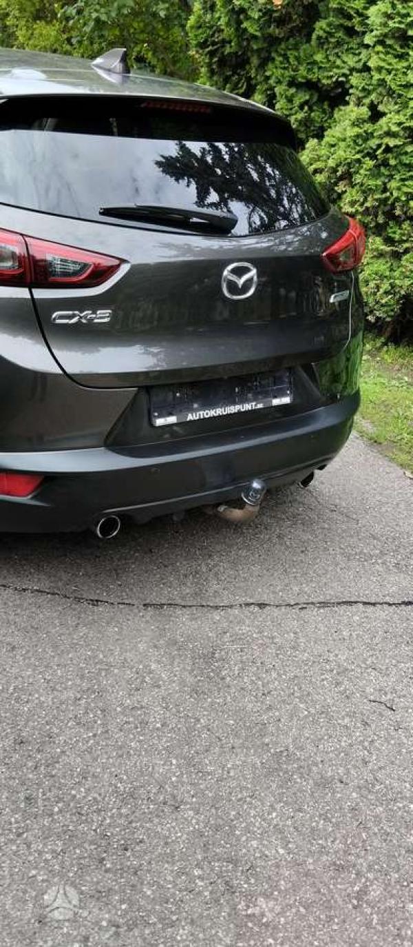 Brown Mazda CX-3 2016 in Kaunas, with an engine capacity of 1.50 L and mileage of 235 thousand km for 7400 €, photo 6 on AUTOMOTO.COM.LV