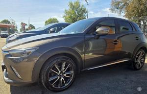 Brown Mazda CX-3 2017 in Marijampole, with an engine capacity of 2.00 L and mileage of 169 thousand km for 14250 €, photo 3 on AUTOMOTO.COM.LV