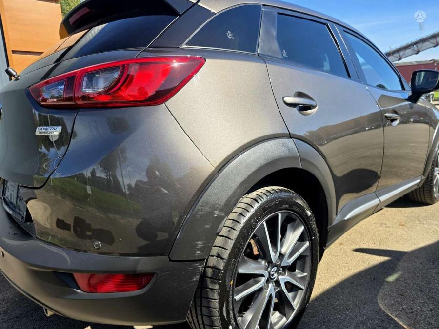 Brown Mazda CX-3 2017 in Marijampole, with an engine capacity of 2.00 L and mileage of 169 thousand km for 14250 €, photo 5 on AUTOMOTO.COM.LV